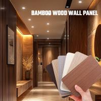 China Modern Bamboo Charcoal Wood Veneer Indoor Decorative PVC Wood Grain Wear Resistant Wall Panel Cladding For Home And Hotel for sale