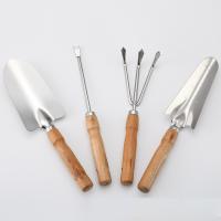 China 4 Piece Stainless Steel Garden Hand Tools Kit With Wooden Handle for sale