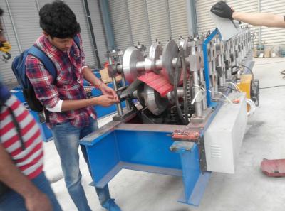 China cnc metal tile roofing ridge cap roll forming machine without pressing device for sale