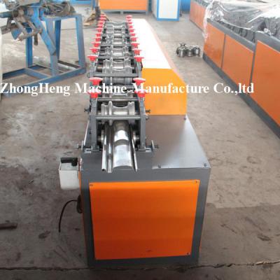 China Galvanized Steel Shutter Door Roll Forming Machine With Punching 8 - 10 m / min for sale