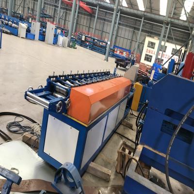 China Hydraulic Cutting Chain Driven Shutter Panel Roll Forming Machine Shutter Door Roll Forming System for sale