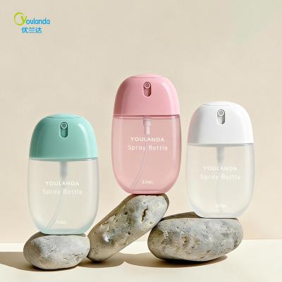 China Portable 50ml Fine Mist Sprayer PETG Plastic Spray Bottle for Essential Oil and Perfume for sale