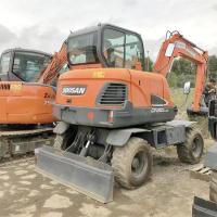 China Doosan DX60W-9 Used 6 Ton Wheel Excavator with 37.9 kW Yanmar Engine and 0.18 m³ Bucket Capacity for sale