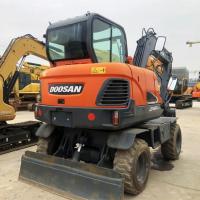 China Doosan DX60W-9 Used 6 Ton Wheel Excavator with 37.9 kW Yanmar Engine and 0.18 m³ Bucket Capacity for sale