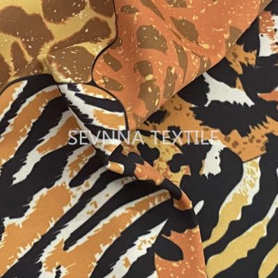 China Sublimation Printed Recycled Swimwear Material Fabric Tricot Warp Knit for sale