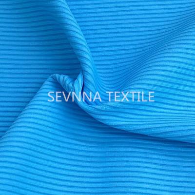 China Spandex Lycra 255gsm Recycled Swimwear Fabric Printable Ribbed Women Bathing Suit for sale