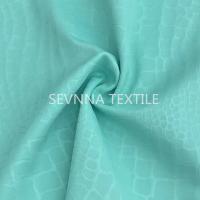 China Recycled Eco Friendly Swimwear Fabric Embossed Print Women Beach Wear for sale