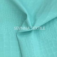 China Recycled Eco Friendly Swimwear Fabric Embossed Print Women Beach Wear for sale