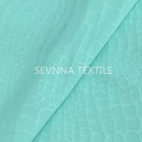 China Recycled Eco Friendly Swimwear Fabric Embossed Print Women Beach Wear for sale