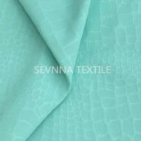 China Recycled Eco Friendly Swimwear Fabric Embossed Print Women Beach Wear for sale