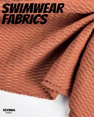 China Premium Textured Swim Fabric with 130cm Width 250gsm Weight and Recycled Nylon Composition for High-Performance Swimwear for sale