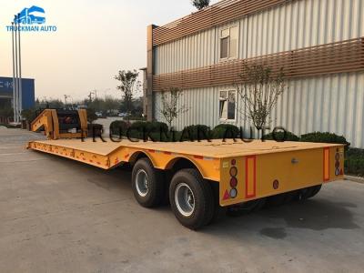 China 2 Axles Low Bed Semi Trailer 20-40 Tons Machine Loading Spring Steel Suspension for sale