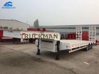 China 3 Axles Low Bed Semi Trailer 60 Ton Capacity Heavy Duty Flatbed Trailer for Construction Equipment for sale