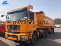 China Hyva Hydraulic Tipper Semi Bottom Dump Trailer 60T Payload 2-6 Axles Construction Material Transit for sale