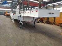 China 70 Ton 4 Axles Low Flatbed Trailer Q345 Steel 12.00R20 Tires Heavy Duty Transport for sale