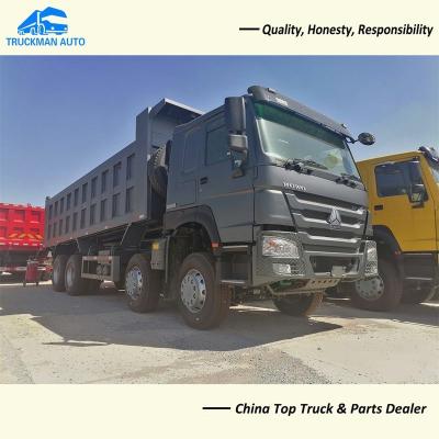 China SINOTRUK HOWO 8x4 RHD Tipper Truck 371HP 28m3 Bucket 40-50 Ton Load for Zambia for sale