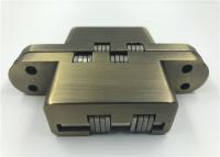 China Antique Brass Concealed Cabinet Hinges / Zinc Alloy Hidden Closet Door Hinges for sale