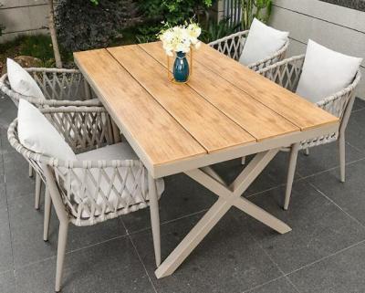 China 4pcs Chairs Outdoor PolyWood Table And Rope Chair Set Long Table Waterproof Patio Garden Furniture Wholesale for sale