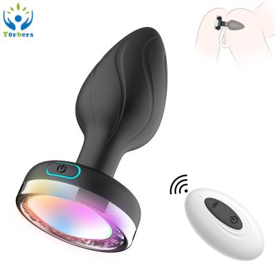 China LED Luminous Anal Plug Wireless Remote Control Vibrator Silicone Sex Toy 10 Modes USB Charging for sale