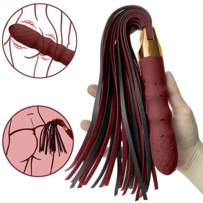 China 2 in 1 PU Silicone Spanking Paddle Whip with 10 Vibration Modes Rechargeable Adult Sex Toy for sale