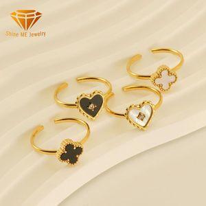 China Heart Shaped Stainless Steel Open Ring for Female Niche High-End Four Leaf Clover Titanium Steel Love Heart Shaped Pattern Ring Jewelry Smr675 for sale