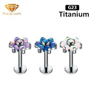 China Implant Grade Titanium Internally Threaded CZ Flower Top Labret with Bezel Set Center and Prong Set Petals Tp1941op for sale
