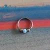 China Piercing Jewelry ASTM F136 Titanium with Opal Balls 1.0mm Segment Hinged Ring Nose Ring Tp2408 for sale