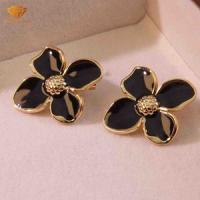 China New French Retro Palace Flower Drop Glazed Four Petal Titanium Steel Earrings High-End and Exquisite Earring Accessories Sfyd6111 for sale