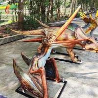 China 3D Fiberglass Realistic Looking Dinosaurs Struggled Pterosauria Statue Outdoor for sale