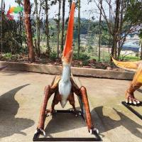 China 3D Fiberglass Realistic Looking Dinosaurs Struggled Pterosauria Statue Outdoor for sale