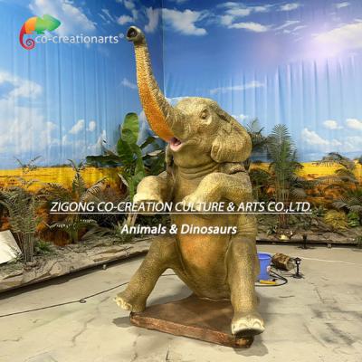 China Realistic Animatronic African Elephant Statue Spraying Water In Safari Setting for sale