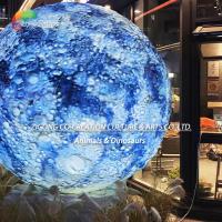 China Ethereal Lunar Sculpture: Crater-Textured Moon Statue In Dreamy Blue Gradient​ for sale