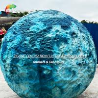 China Ethereal Lunar Sculpture: Crater-Textured Moon Statue In Dreamy Blue Gradient​ for sale
