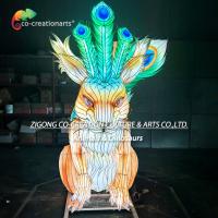 China Giant Illuminated Squirrel Sculpture Lantern With Dazzling Peacock Feather Tail for sale