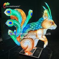 China Giant Illuminated Squirrel Sculpture Lantern With Dazzling Peacock Feather Tail for sale