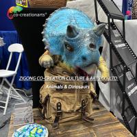 China Interactive Baby Triceratops Dinosaur Backpack With Animatronic Movement Effects for sale