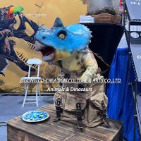 China Interactive Baby Triceratops Dinosaur Backpack With Animatronic Movement Effects for sale