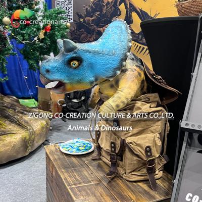 China Interactive Baby Triceratops Dinosaur Backpack With Animatronic Movement Effects for sale