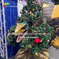 China Christmas Animatronic Raptor Dinosaur With Tree Decoration For Theme Parks And Holiday Events for sale