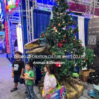 China Christmas Animatronic Raptor Dinosaur With Tree Decoration For Theme Parks And Holiday Events for sale