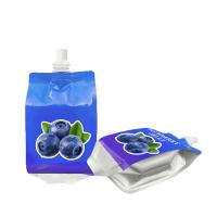 China Quad Seal Shaped Custom Drink Pouches User Friendly Juice Packaging Pouch for sale