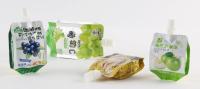 China Quad Seal Shaped Custom Drink Pouches User Friendly Juice Packaging Pouch for sale