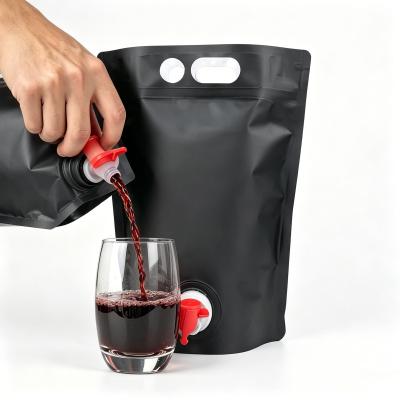 China Matte Black Stand Up Tap Pouch With Dual Carry Handles | High Barrier Aluminum Foil Dispenser Spout Bag For Wine, Cold Brew Coffee & Bulk Beverages for sale