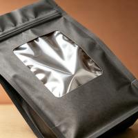 China Custom Printed 500g Matte Black Kraft Stand‑Up Coffee Pouch with Window | High‑Barrier Packaging for Whole Bean Coffee for sale