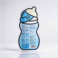 China 40g Custom Bottle‑Shaped Die‑Cut Pouch, Custom Printed Irregular Flexible Bag for Kitten Milk Cake Cat Soft Wet Pet Food Packaging for sale