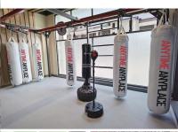 China Freestanding Punching Bag Boxing Training New Style Heavy Standing Boxing Sand Bag Leather Customized Logo Punching Bag for sale
