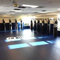 China Black White 2.4M Floor Mounted Punching Bag Rack For Heavy Bag for sale