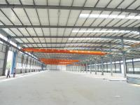 China Custom Prefabricated Steel Structure Buildings with 50-Year Lifespan and Q235-Q355B Steel Grade Options for sale