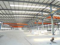 China Custom Prefabricated Steel Structure Buildings with 50-Year Lifespan and Q235-Q355B Steel Grade Options for sale