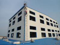 China Prefabricated Steel Frame Industrial Building with Large Span Design - Q235/Q355B Materials, Custom Dimensions for sale